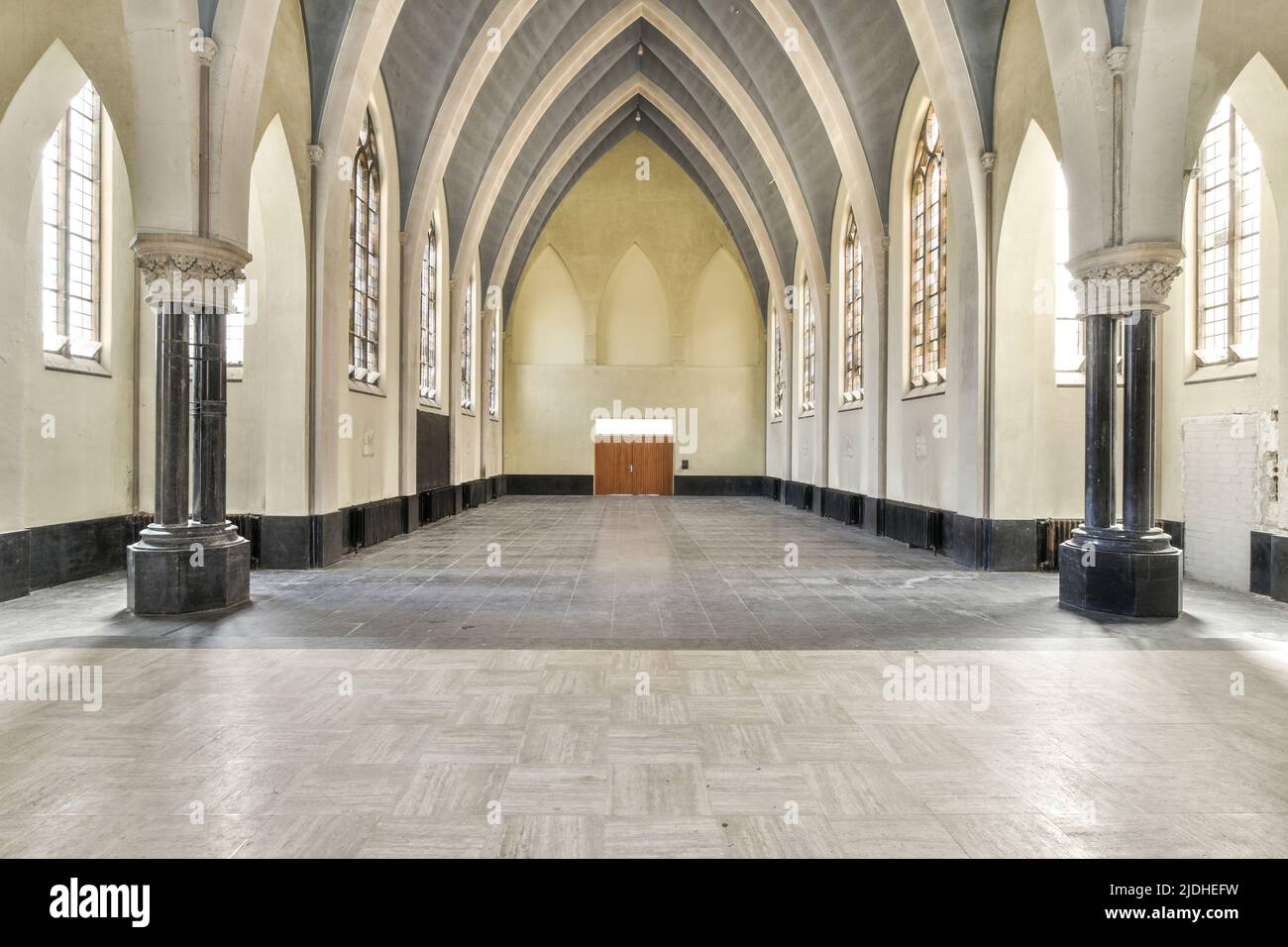 Panoramic interior view of the city church with many large bright ...