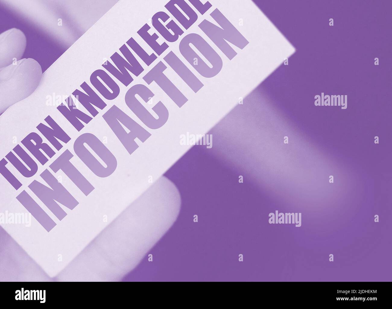 Turn Knowledge Into Action card in businessman hand. Business concept ...