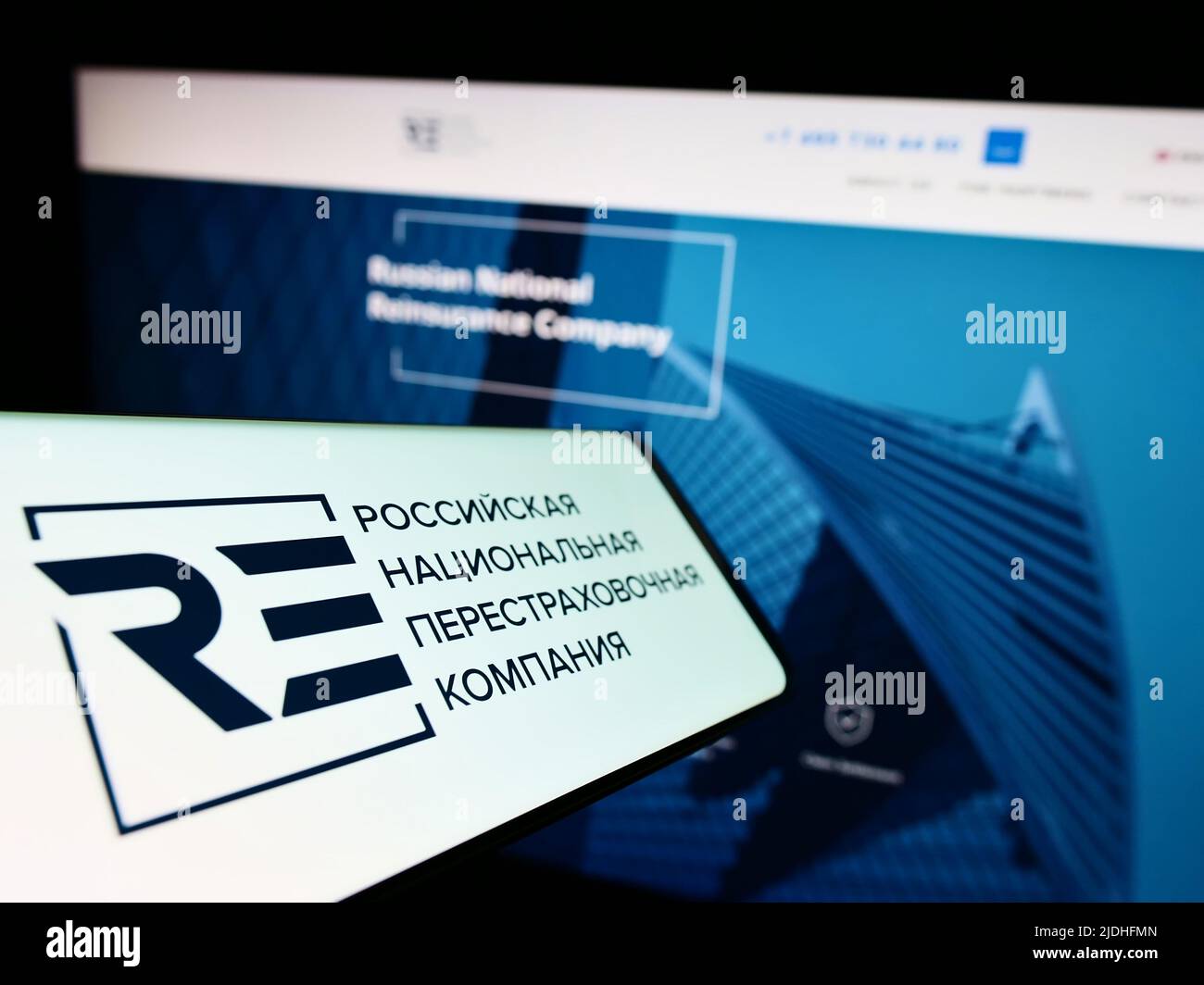 Mobile phone with logo of Russian National Reinsurance Company (RNRC ...
