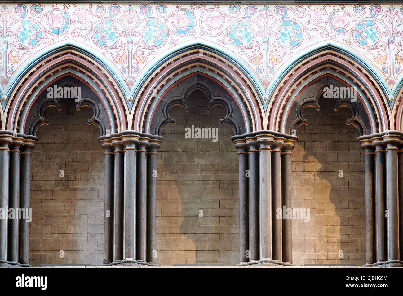 Painted wall above a trio of arches on the clerestory of the thirteenth ...