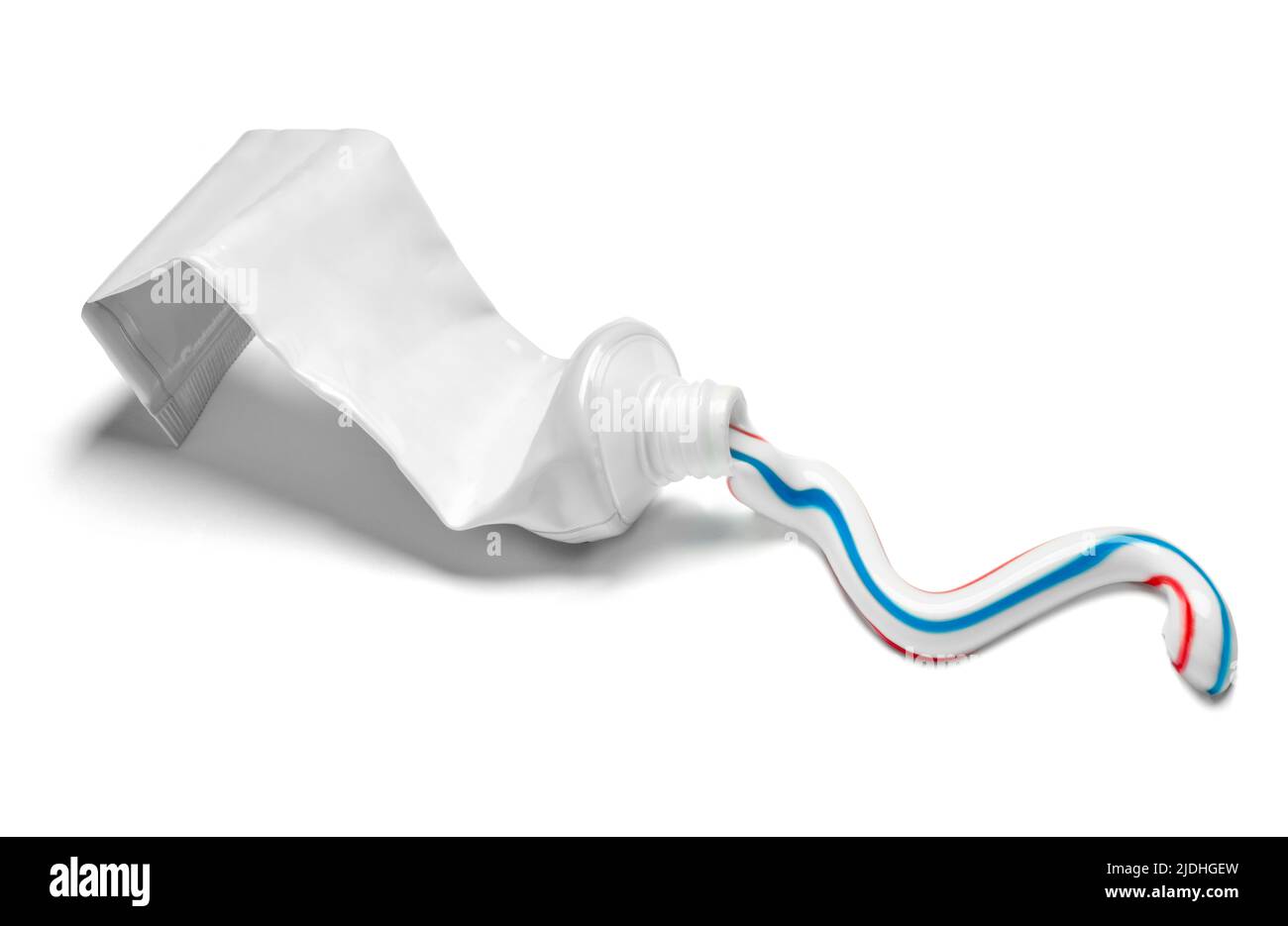close up of a used empty toothpaste tube on white background Stock ...