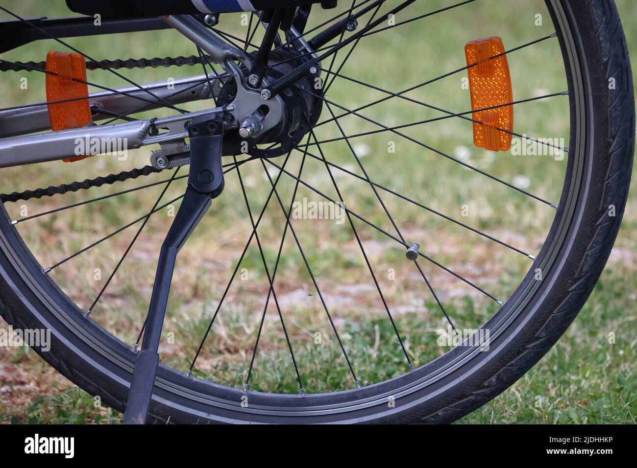 Fragment of a bicycle wheel. Tires, rims and spokes Stock Photo - Alamy
