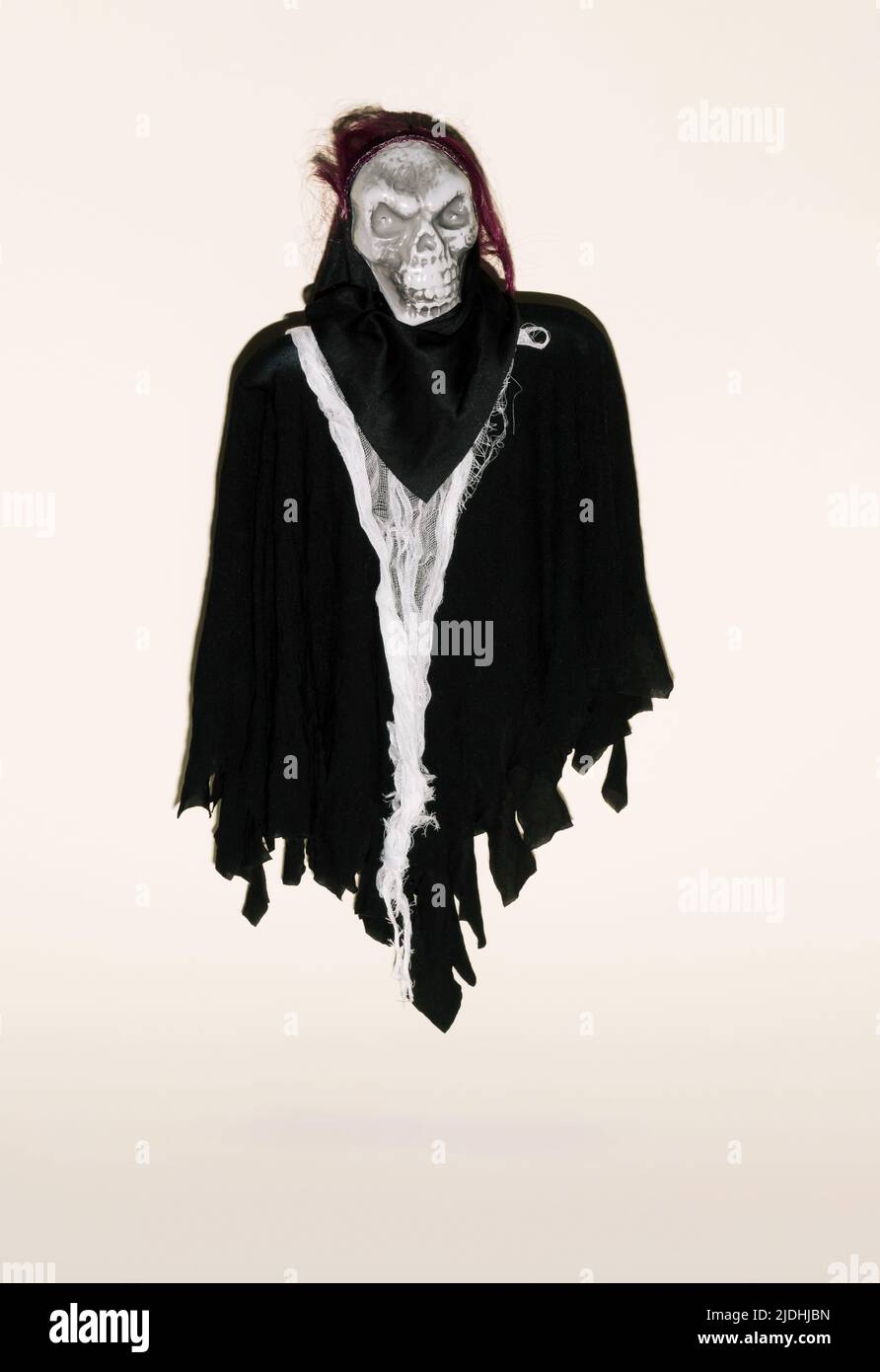 Scary Halloween ghost made of skull and black rags. Santa Muerte ...