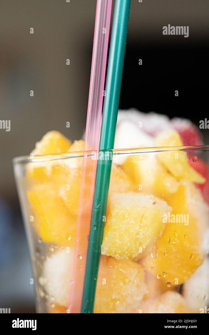 Glass of Frozen Tropical Fruits to prepare a healthy Smoothie Stock ...
