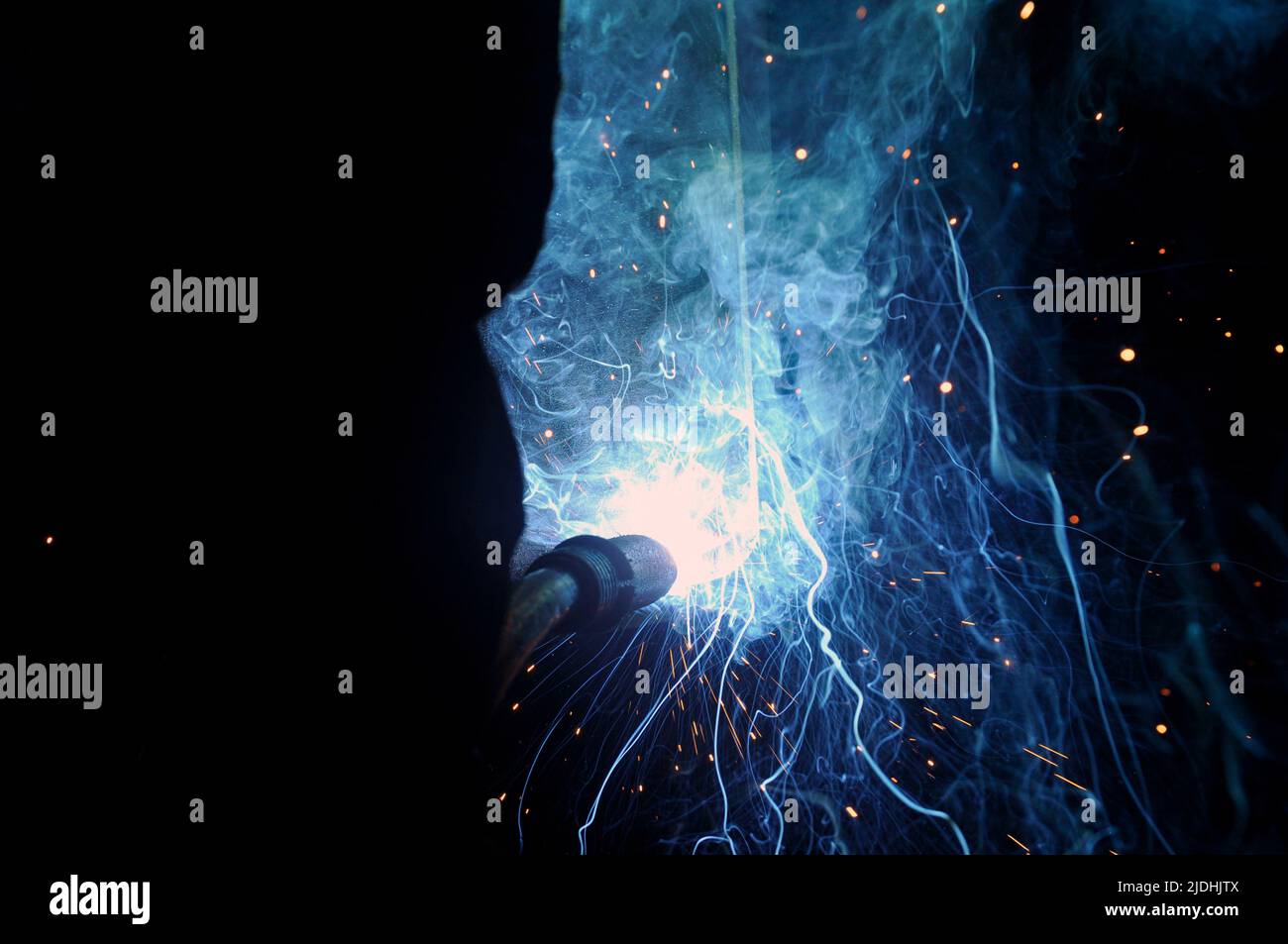 Welding arc. The process of welding products and metal. Sparks fly ...