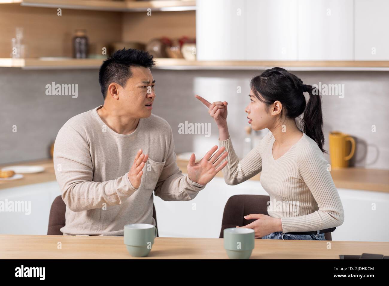 Man cooking woman drinking coffee hi-res stock photography and images ...