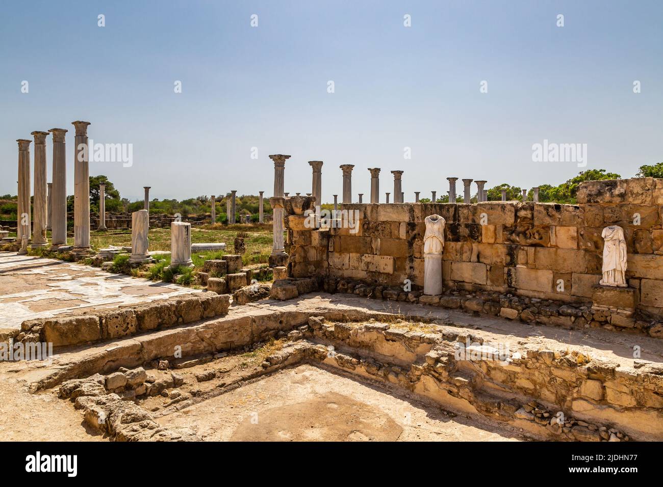 The ruins at ancient Salamis in Northern Cyprus, with a blue sky ...