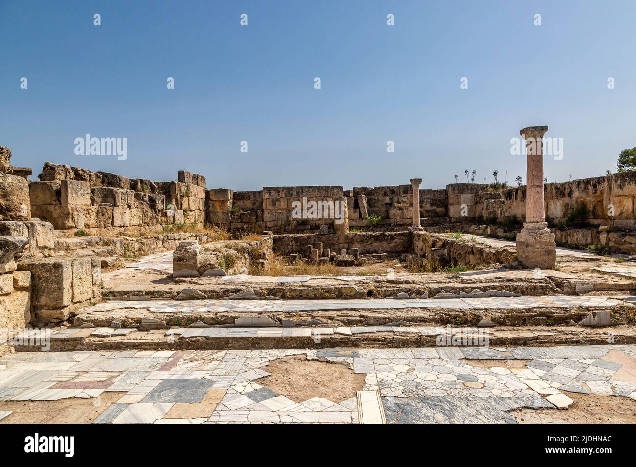 The ruins at ancient Salamis in Northern Cyprus, with a blue sky ...
