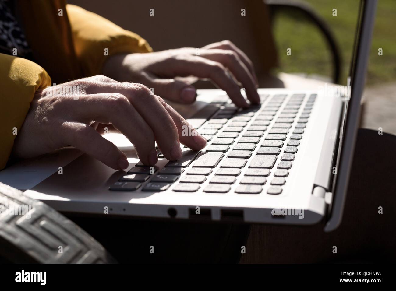 Freelancer hands computer keyboard typing message text Stock Photo - Alamy