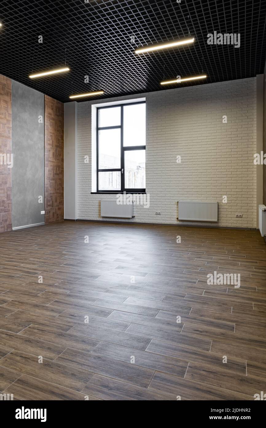 Empty open space office room with window Stock Photo - Alamy