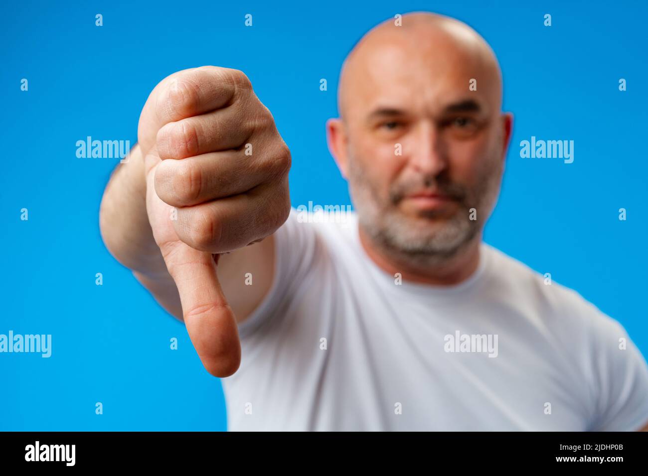 Handsome middle age senior man showing rejection and negative with ...