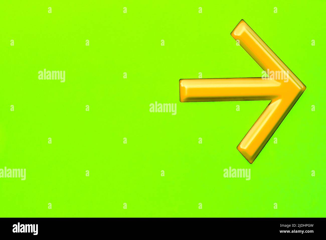 Green banner flag with a yellow arrow indicating the direction for your ...