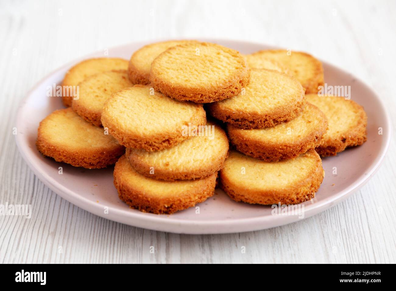 Homemade Pure Butter Shortbreads on a Pink Plate, side view. Close-up ...