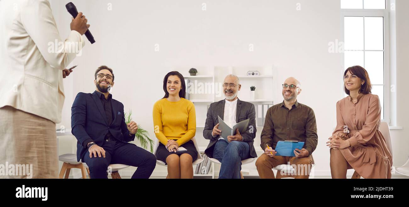 Banner shot of coach lead meeting with employees Stock Photo - Alamy