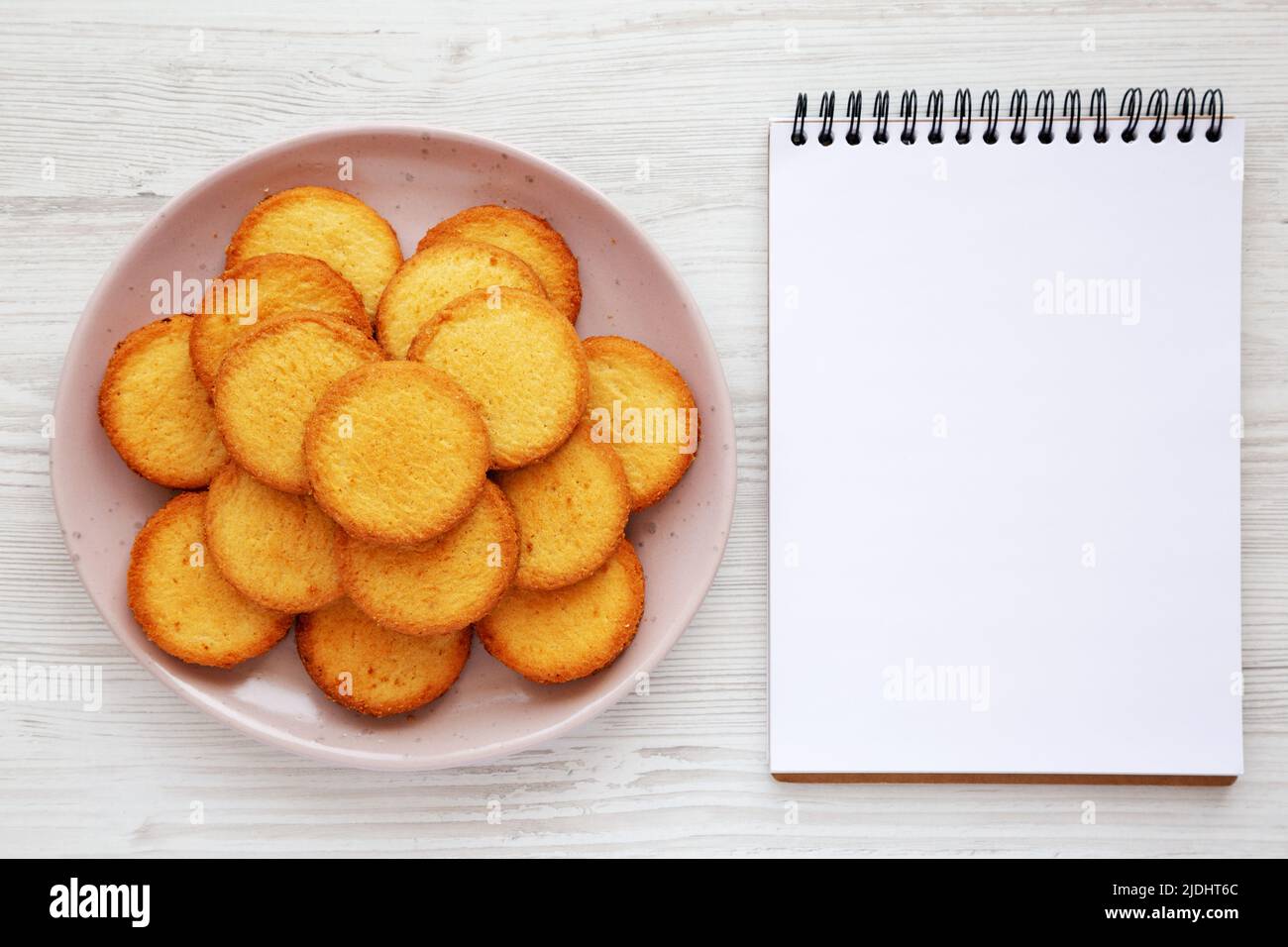 Homemade Pure Butter Shortbreads on a Pink Plate, blank notepad, top ...