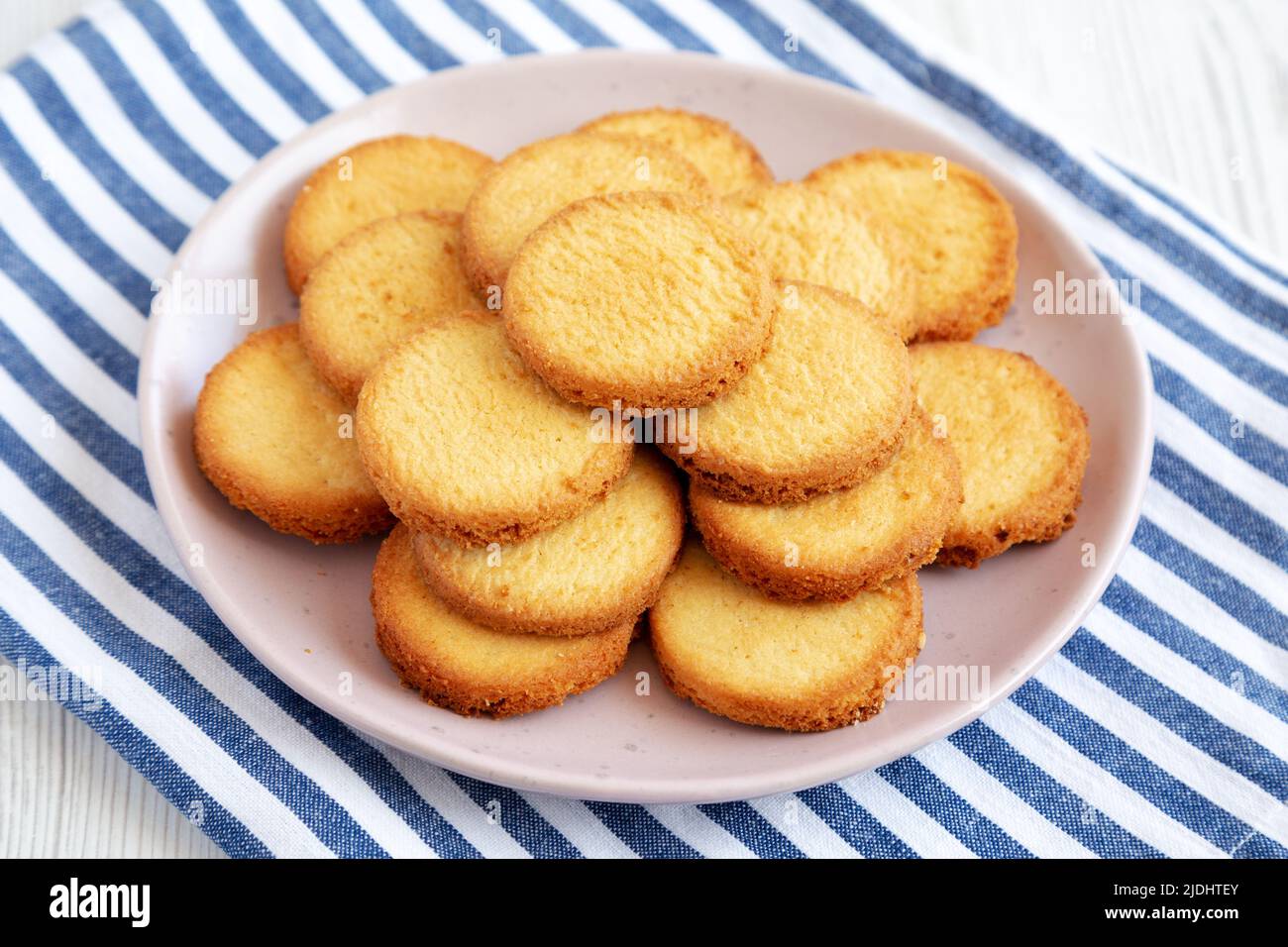 Homemade Pure Butter Shortbreads on a Pink Plate, side view. Close-up ...