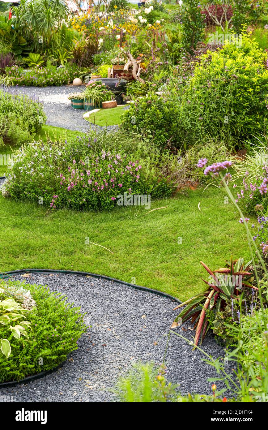 Landscape design of flowers and plants for modern flower gardens Stock ...