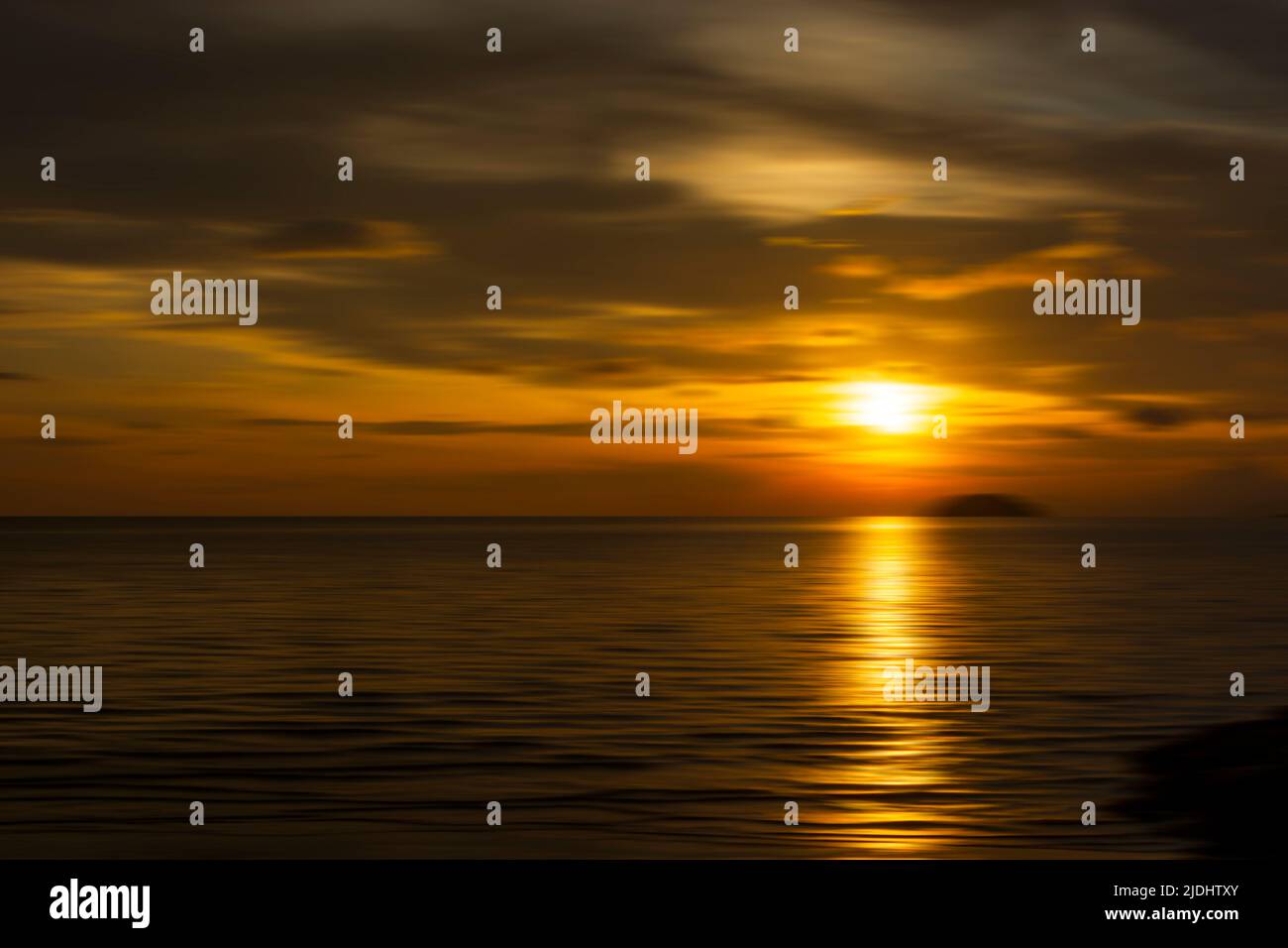 Sunset background at the beach of Tanjung Aru, Sabah, Malaysia with ...