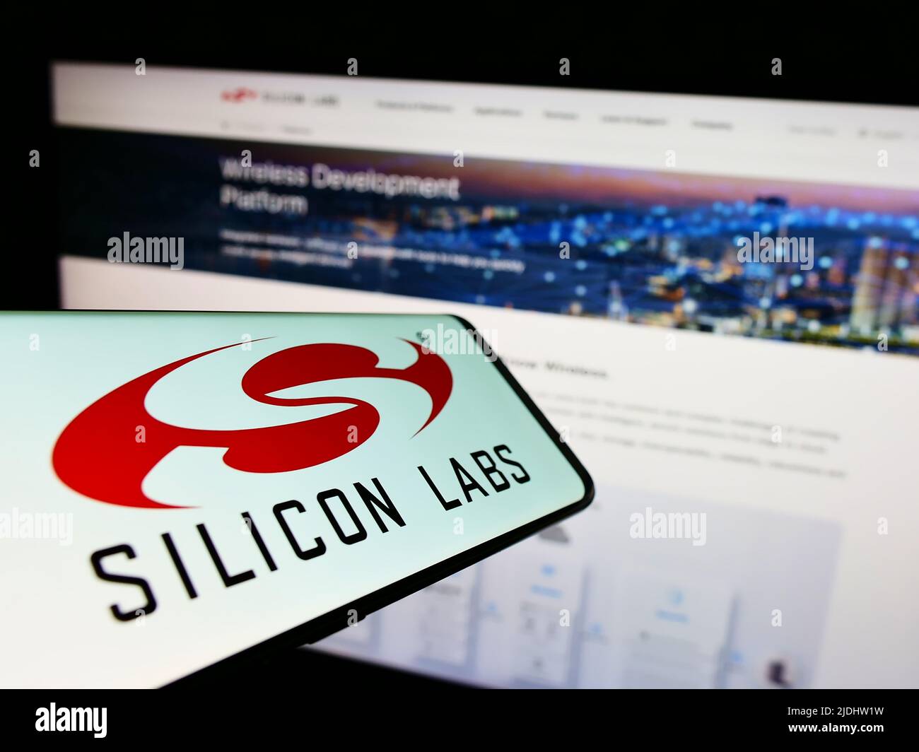 Cellphone with logo of semiconductor company Silicon Laboratories Inc ...