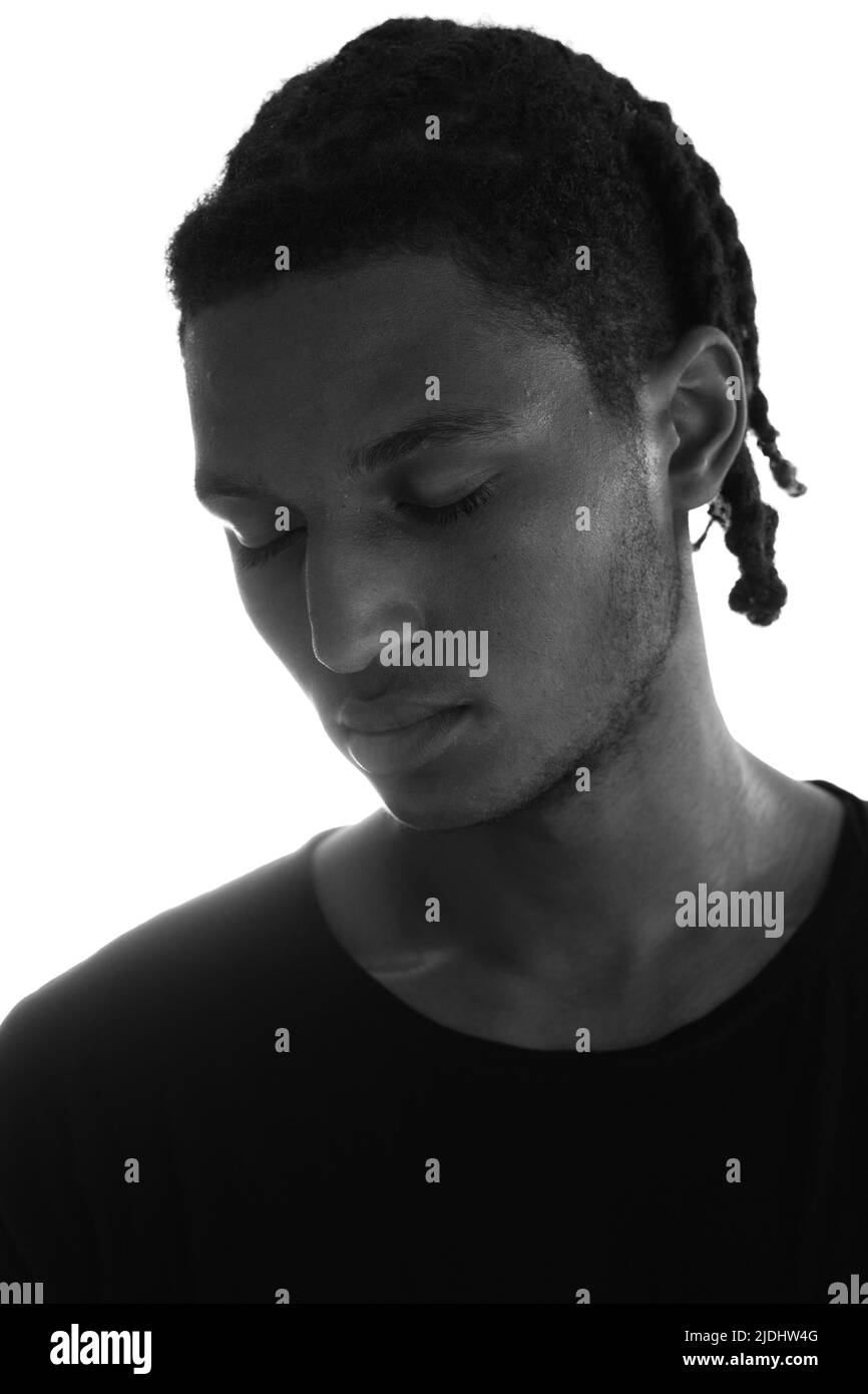 Profile portrait of a young African American man isolated on a white ...