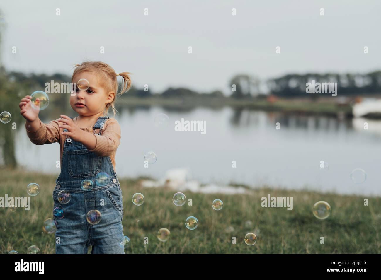 Little Girl Playing with Bubbles Outdoor, Kid Having Fun Time Open Air ...