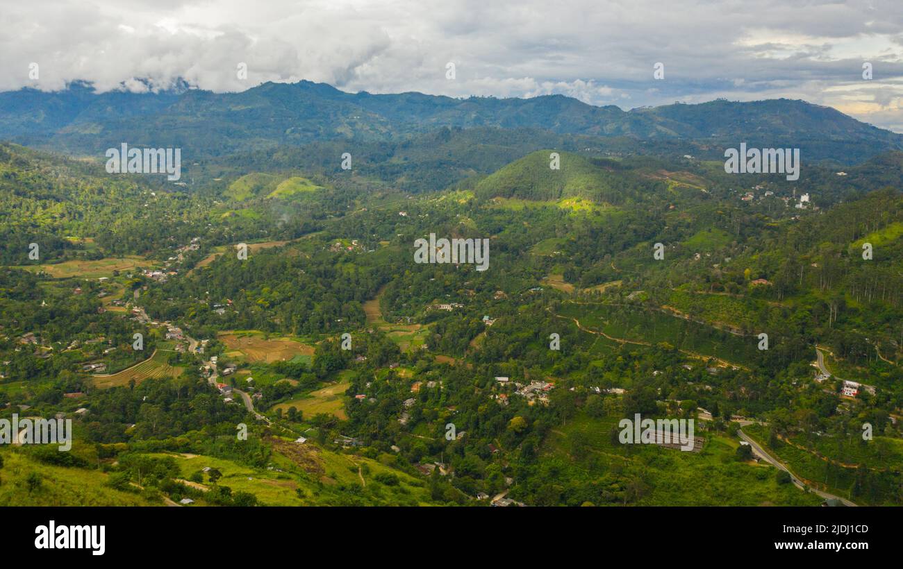 Aerial view of town of Ella is surrounded by green hills with tea ...
