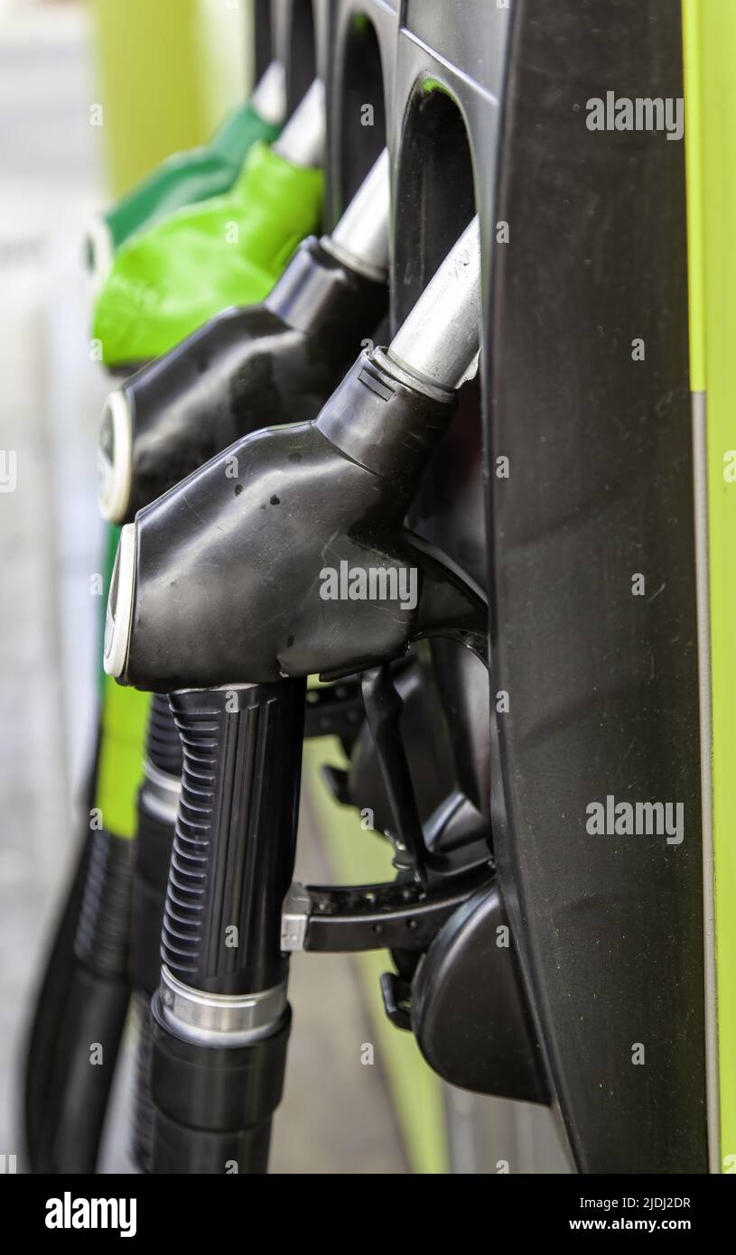 Detail of manual pumps to put gasoline in a vehicle Stock Photo - Alamy