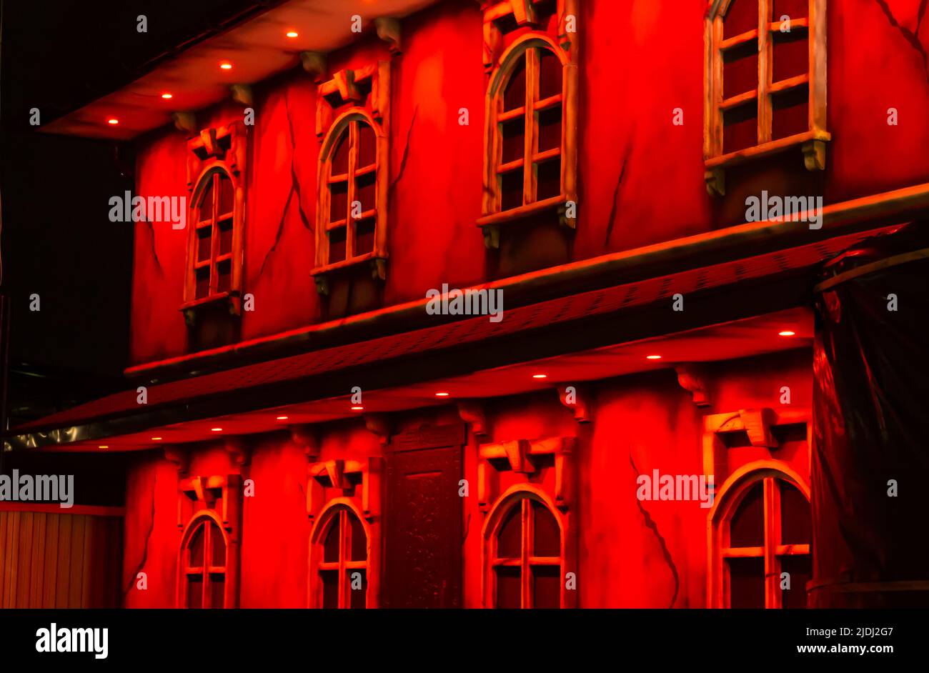 Old spooky haunted abandoned house with surreal red moonlight Stock ...