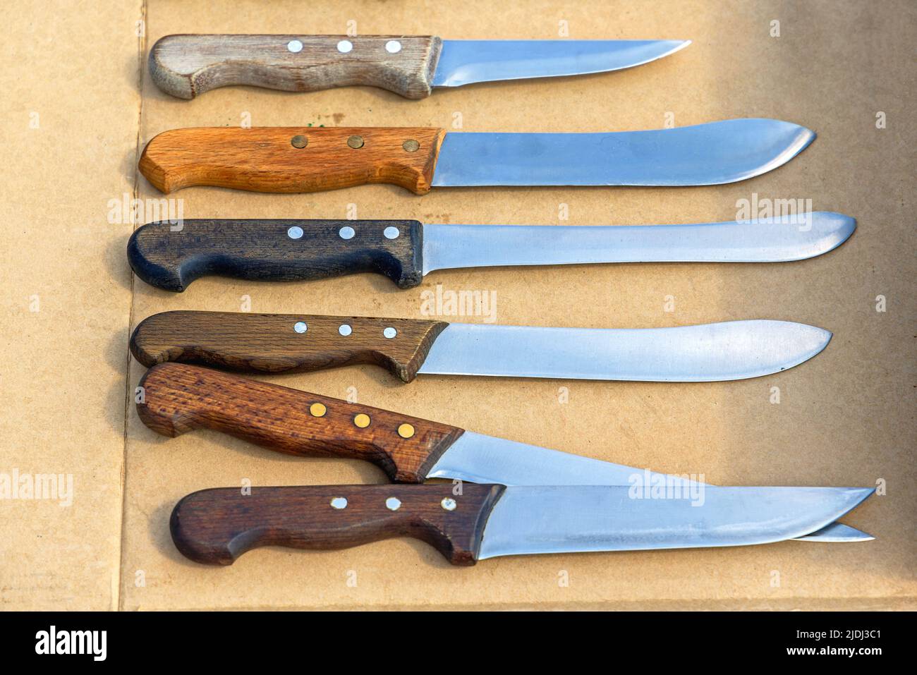 Used Butcher Knife Set With Wooden Handles Stock Photo - Alamy