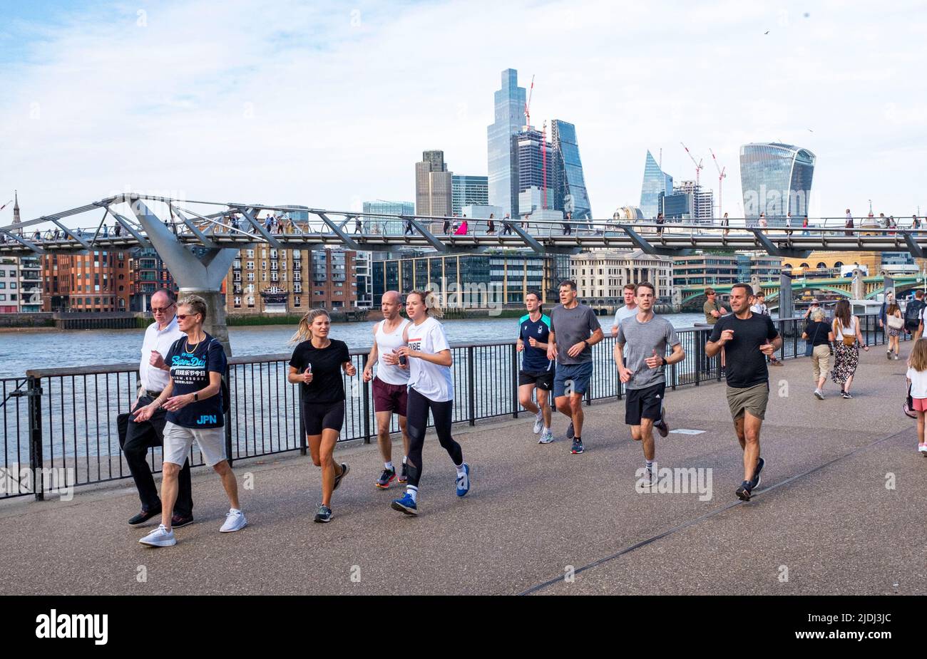 River Thames Views South Bank ,London , England UK - Runners on the ...
