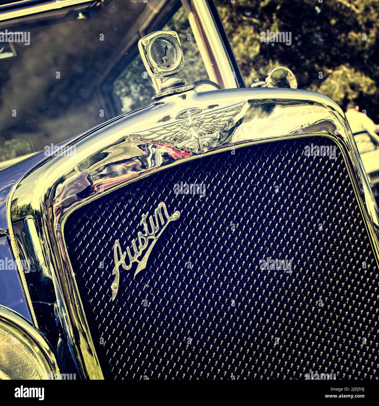 Close up radiator grille detail of a classic vintage blue Austin motor ...
