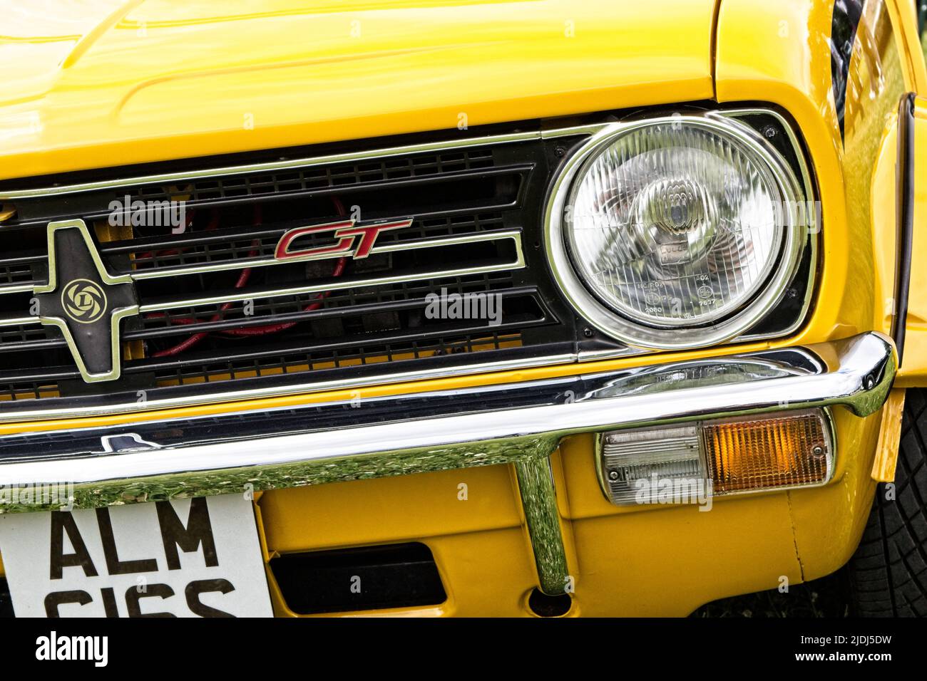 Close up detail of a bright yellow Mini 1275 GT classic vintage motor ...