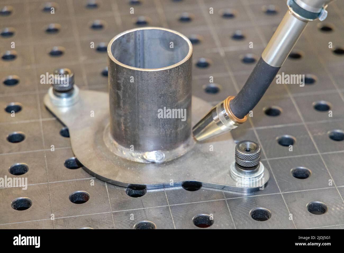 Automated Welding Robot Process Metal Pipe at Work Table Stock Photo ...