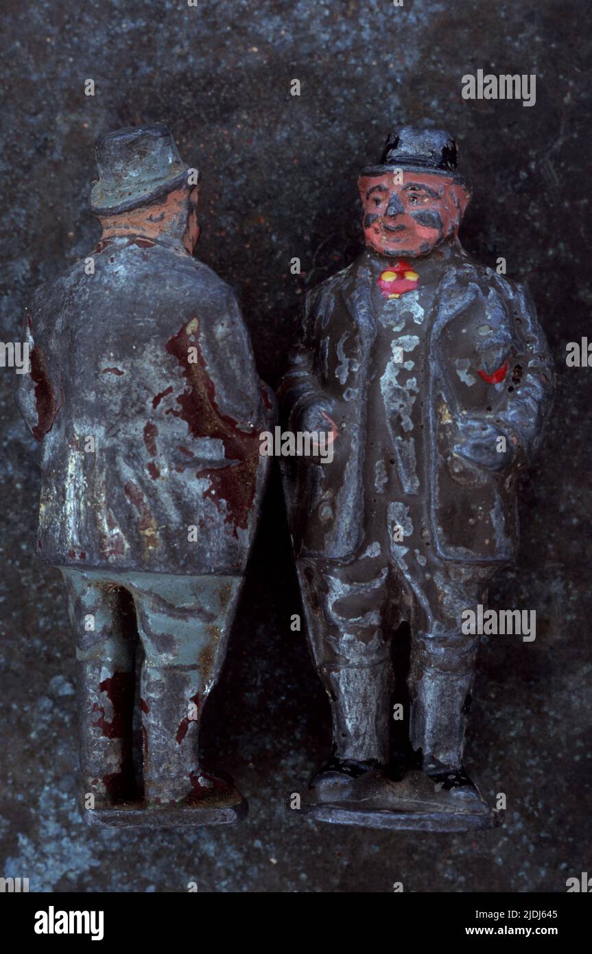 Worn lead models of two almost identical rotund 19th century farmers ...