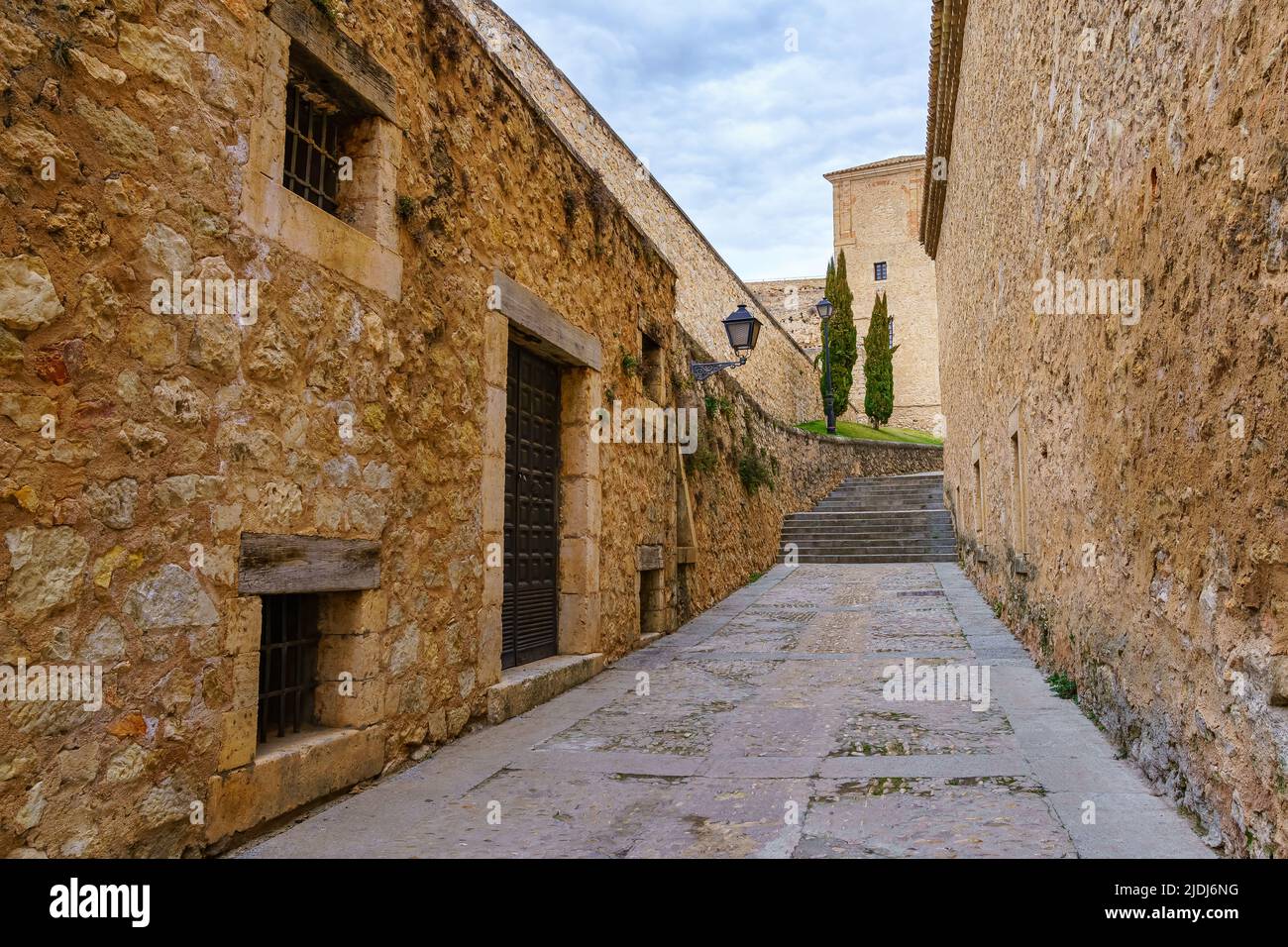 Old alley with stone medieval houses in the city of Cuenca, Spain Stock ...