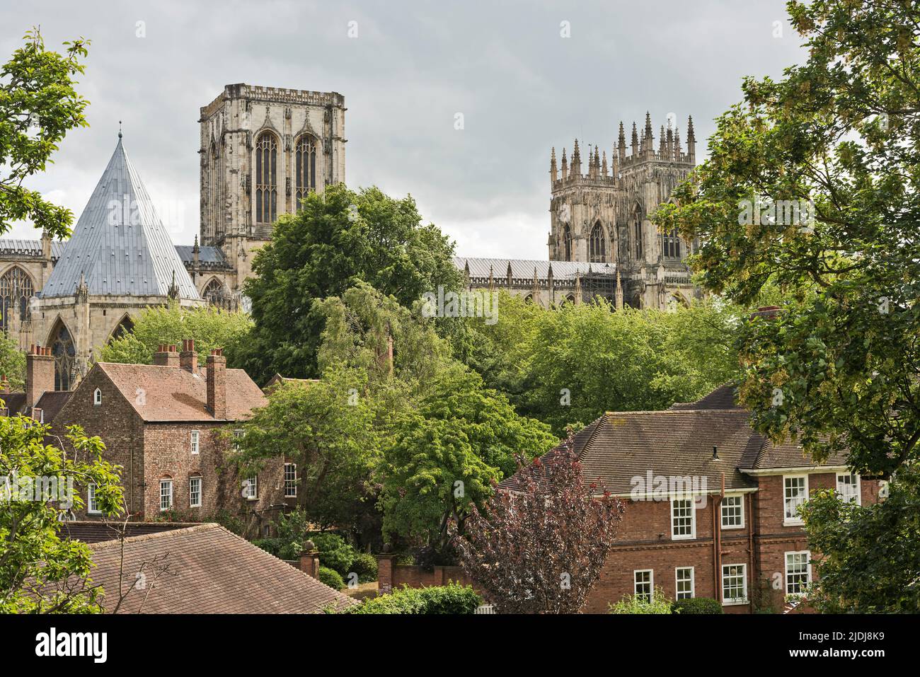 Spires and roof of York minster cathedral viewed from city walls ...