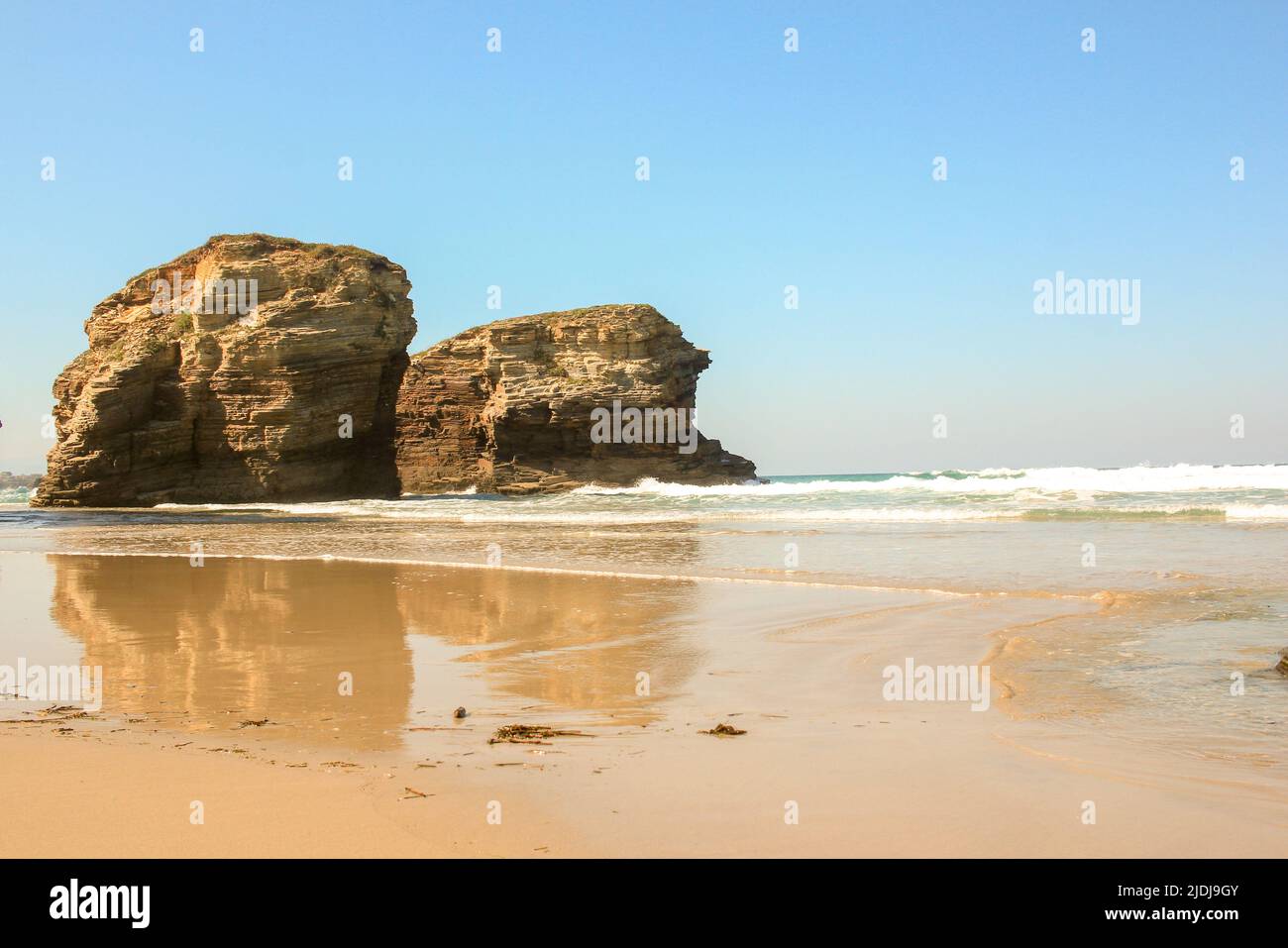 a day on the beach among the rocks and cold water Stock Photo - Alamy