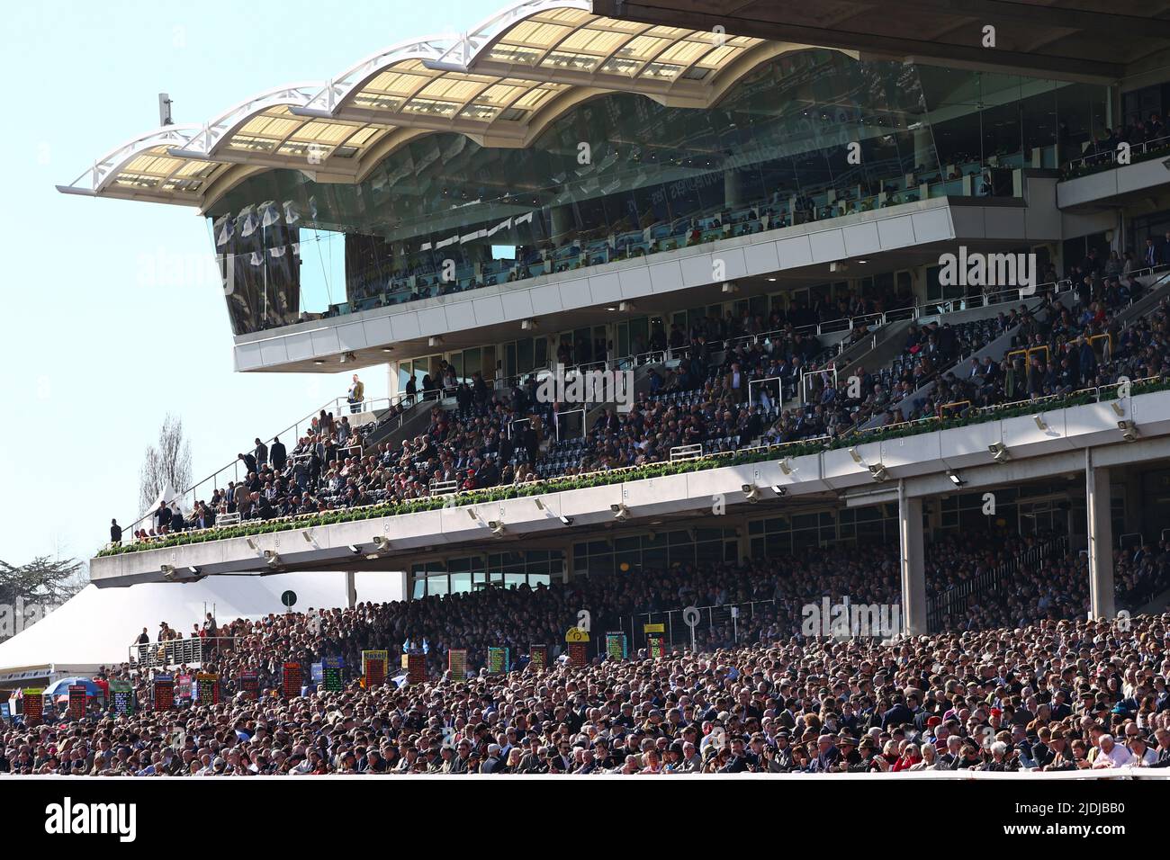 The crowd watch the racing from the Grandstand during the 2022 ...