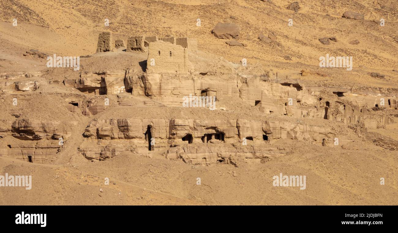 View of Tombs of The Nobles from the River Nile at Aswan, Upper Egypt ...