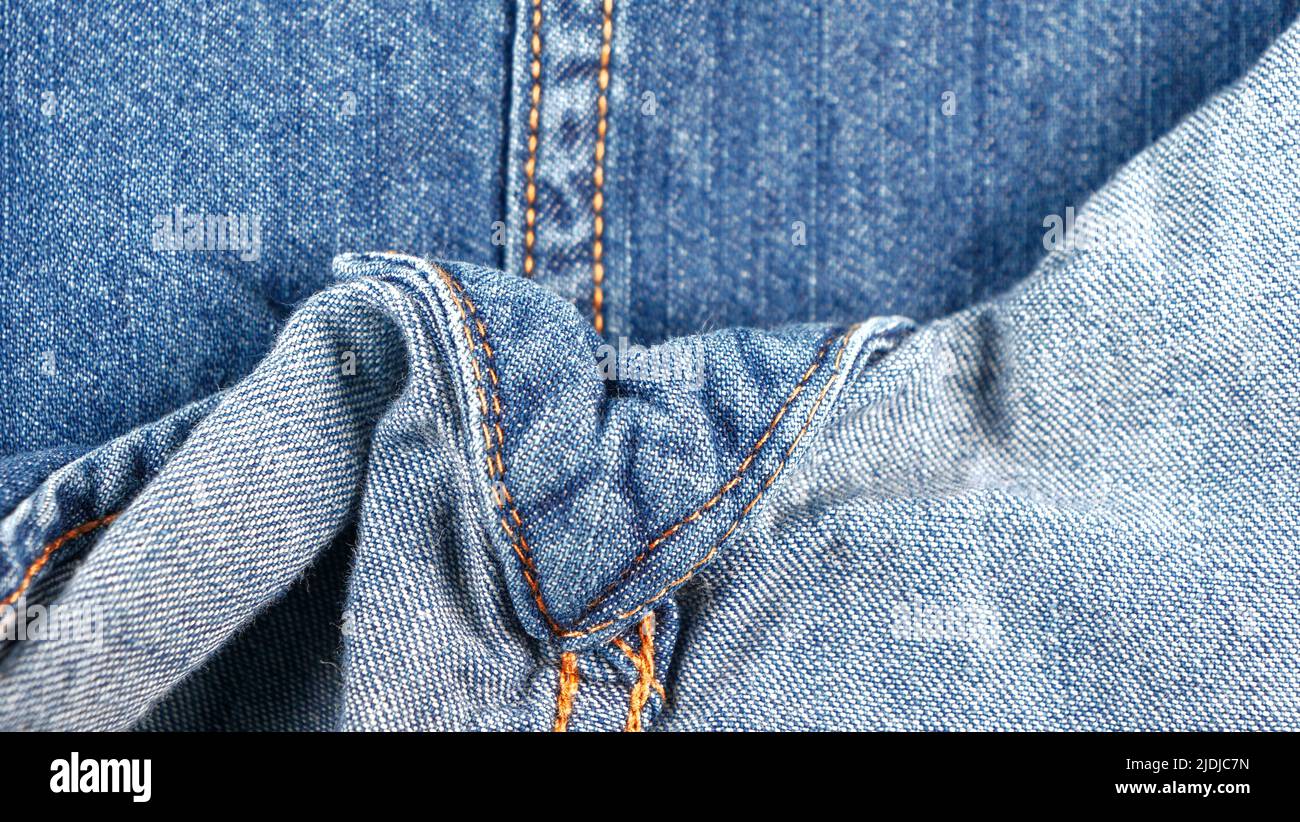Calm jeans texture, wrinkled jeans, fabric textured background, cloth ...
