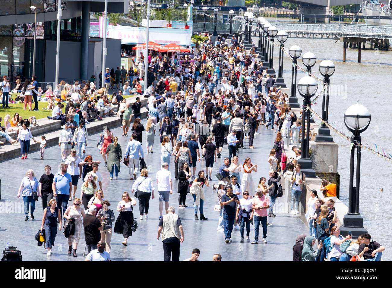 The Queen's Walk on the south bank of the River Thames near Tower ...