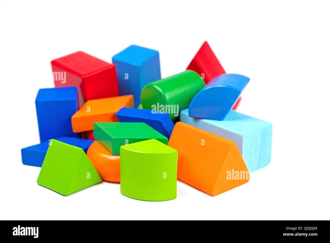 Wooden building blocks against a white background Stock Photo - Alamy