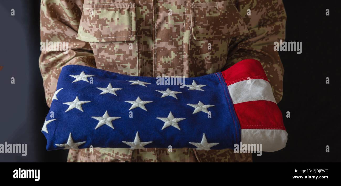 American army soldier in USA military digital pattern uniform, holds ...