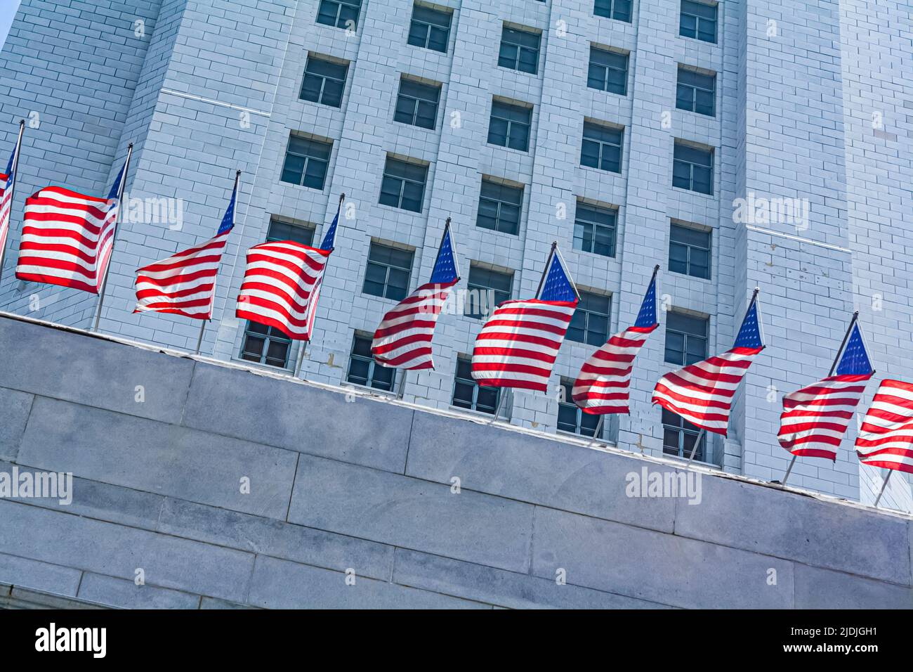 American flags outside a government building in Los Angeles Stock Photo ...