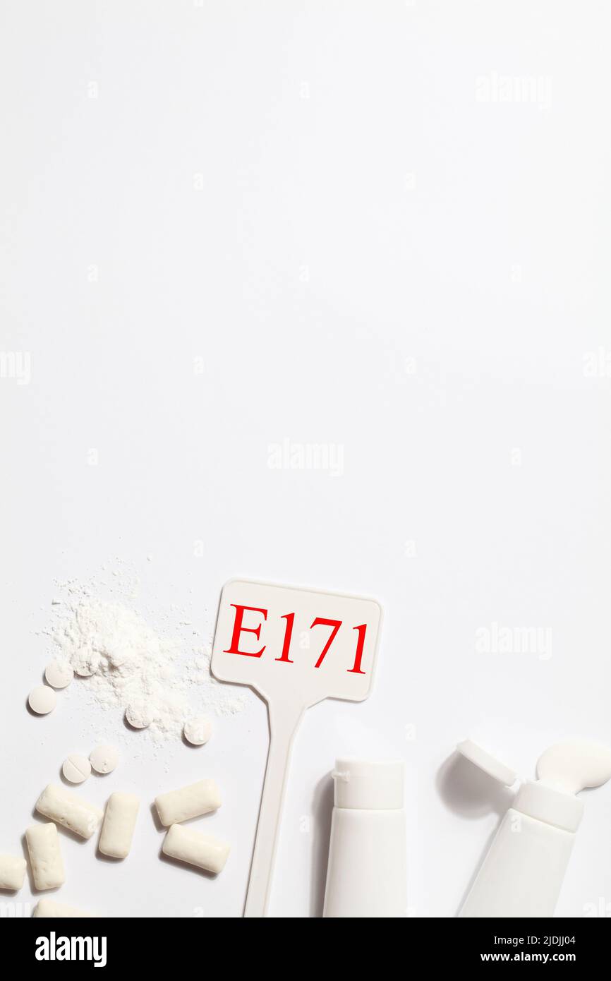 Titanium dioxide, E171, dangerous additive concept. gum, pills ...