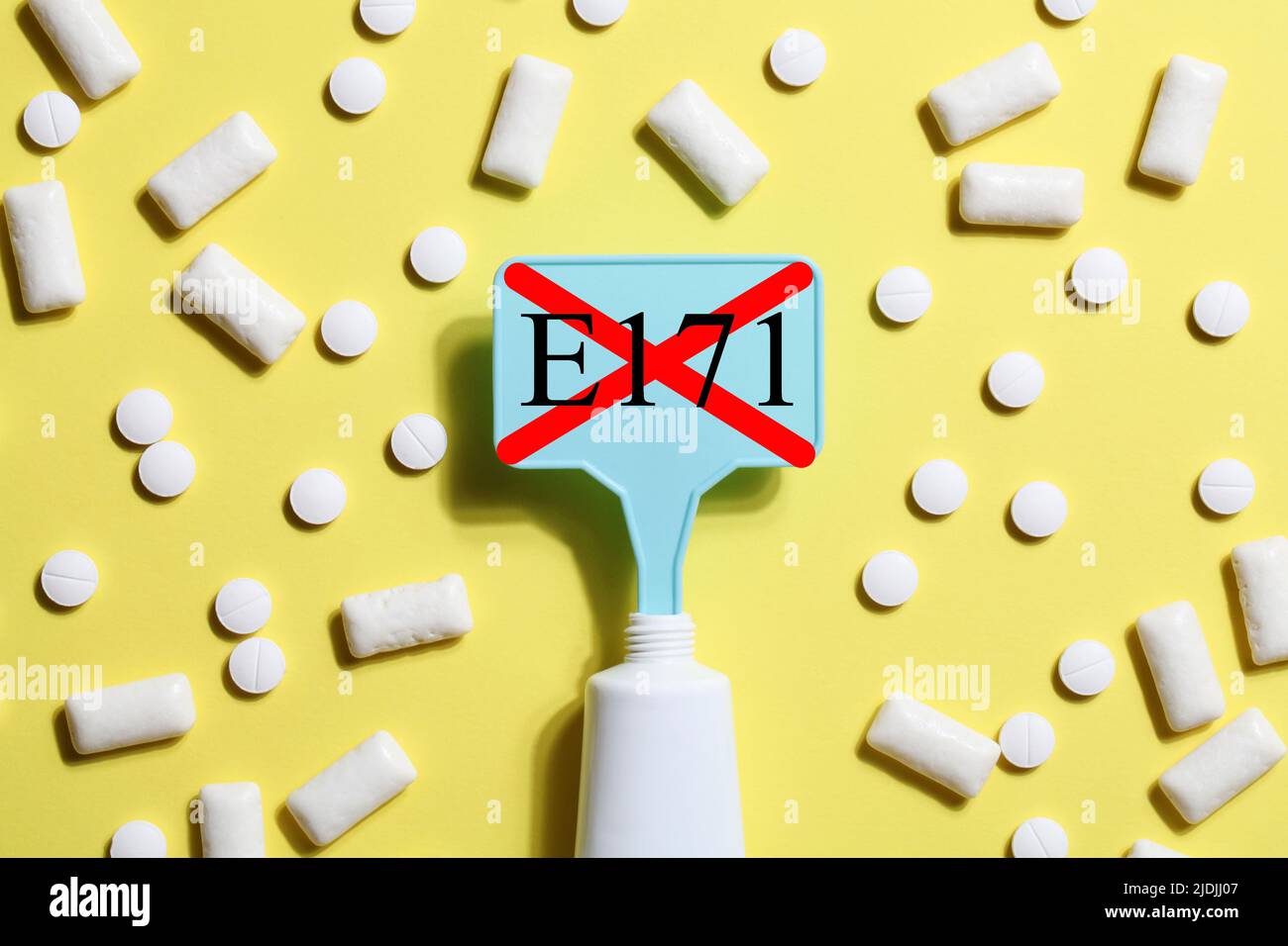 Titanium dioxide, E171, dangerous additive concept. gum, pills ...