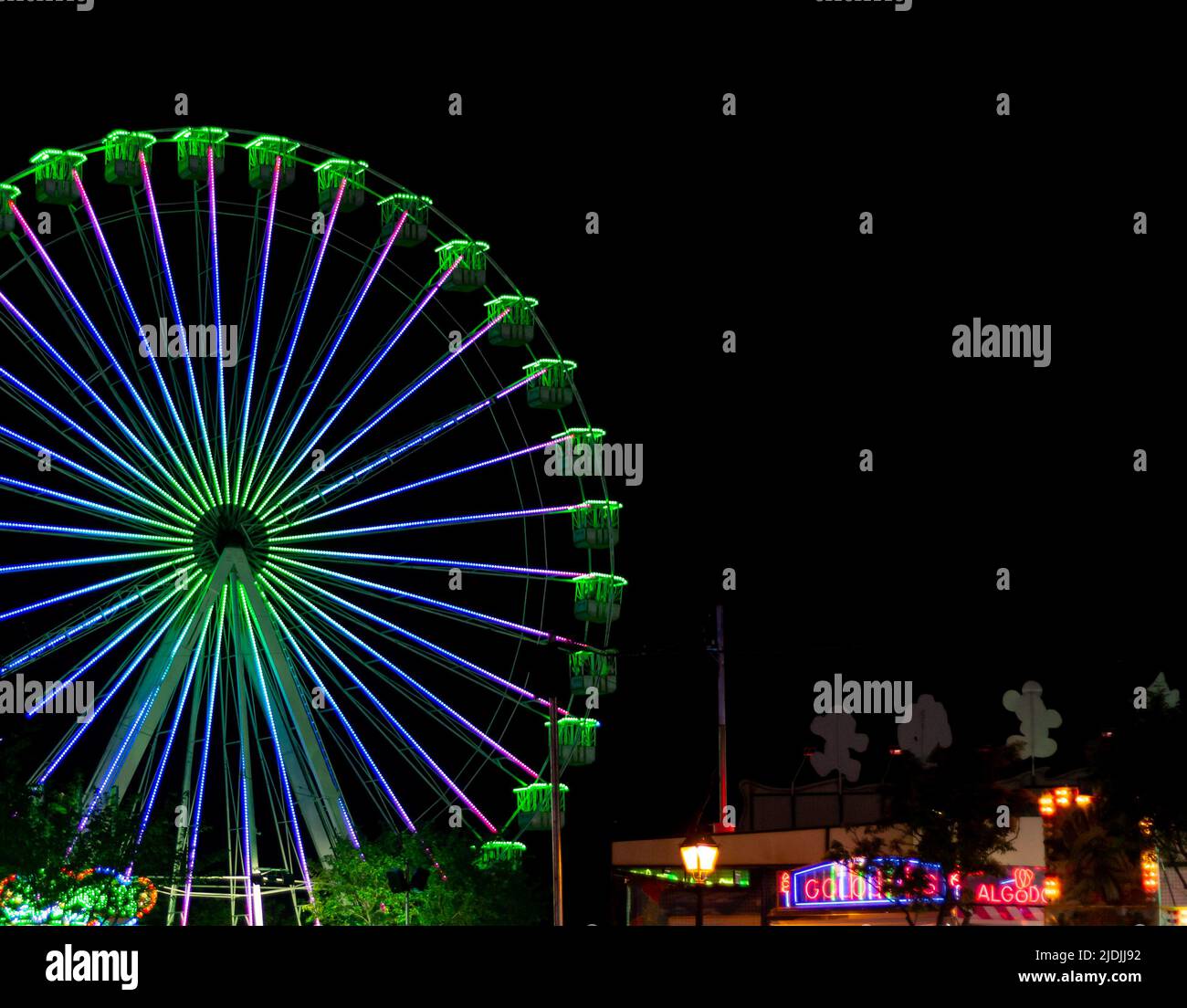 Colorful Ferris wheel at the fair Stock Photo - Alamy
