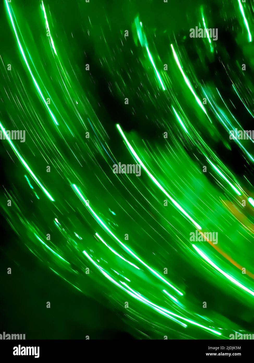 Lights moving in circular green pattern. Motion radial bokeh for ...