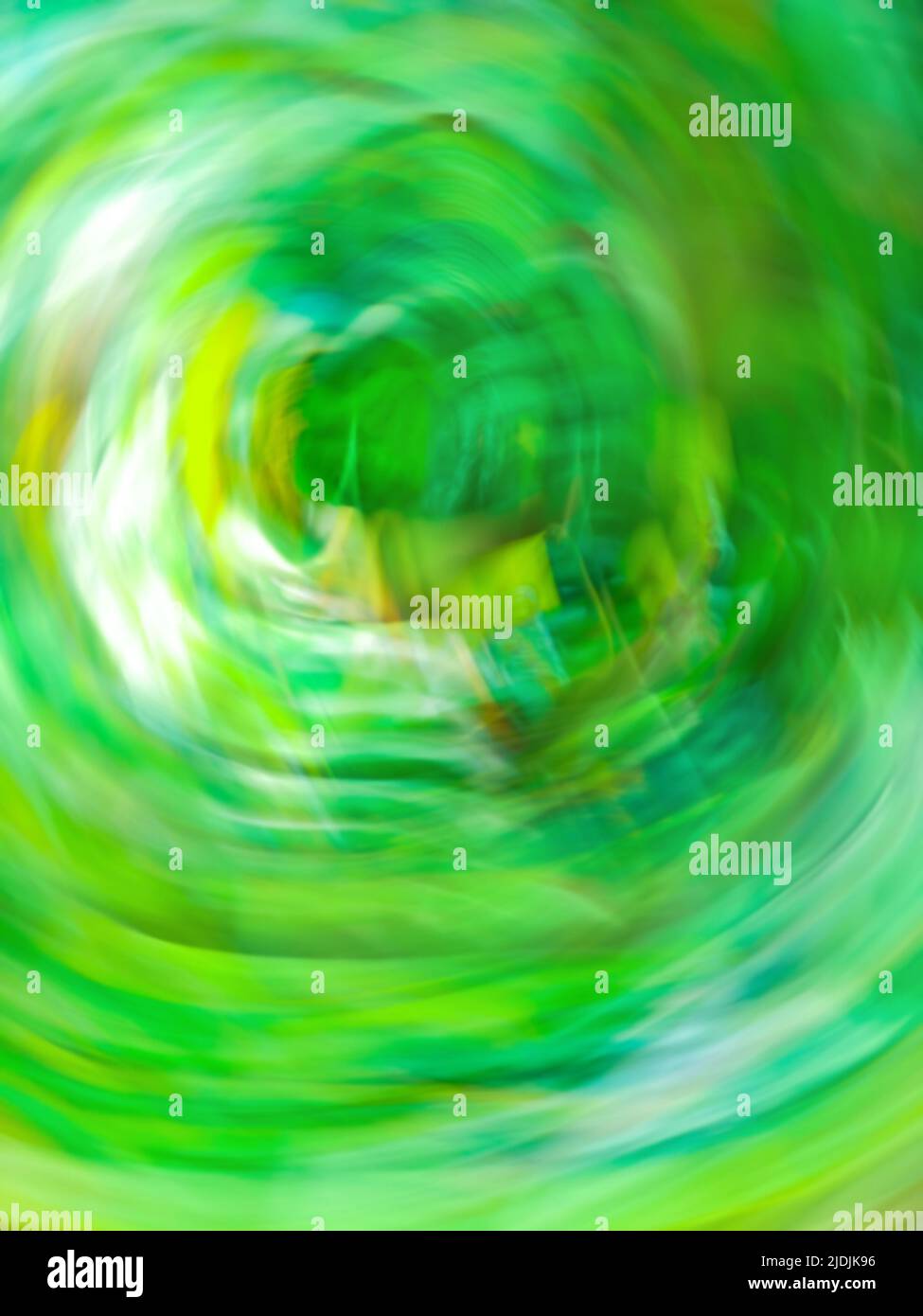 Abstract green light trail vortex. Lights moving in circular green ...