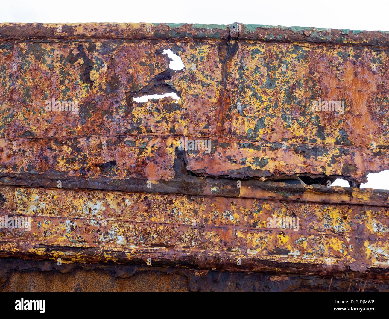 Rusting metal on a shipwrecked boat on Roa Island in Morecambe Bay ...